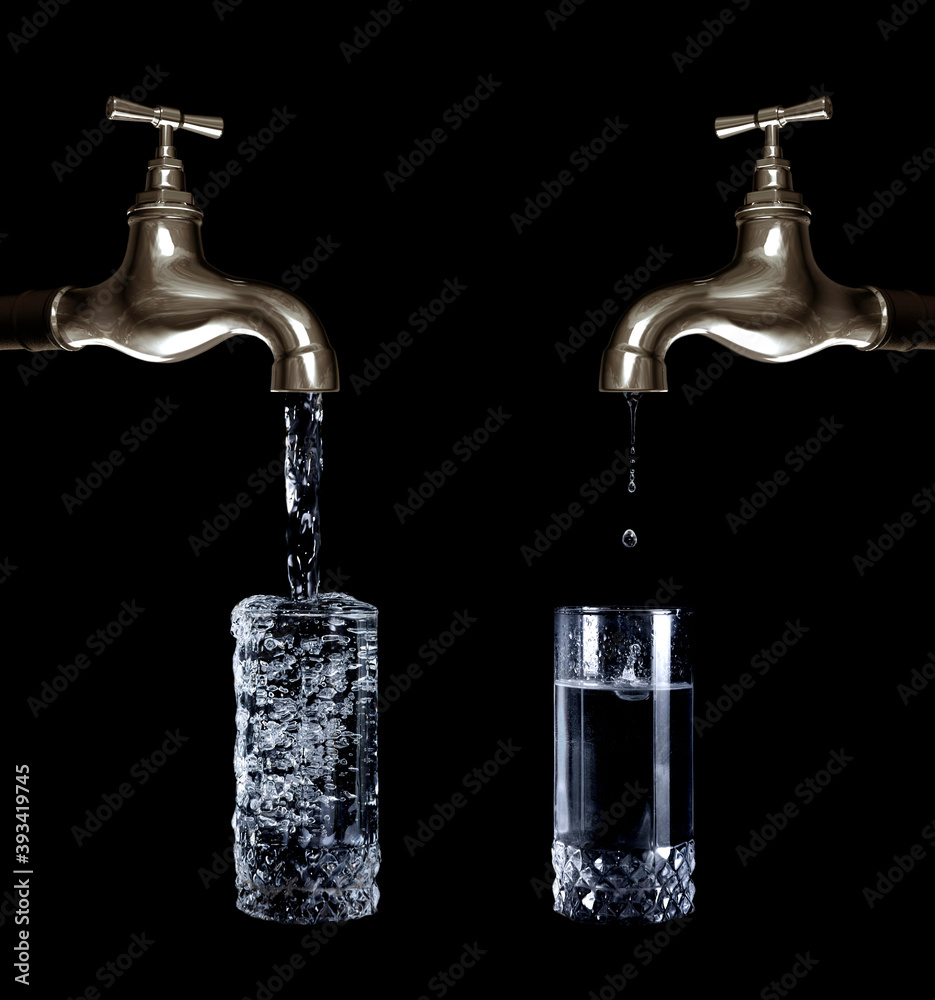 Water running and dripping from two taps into glasses. Water economy ...