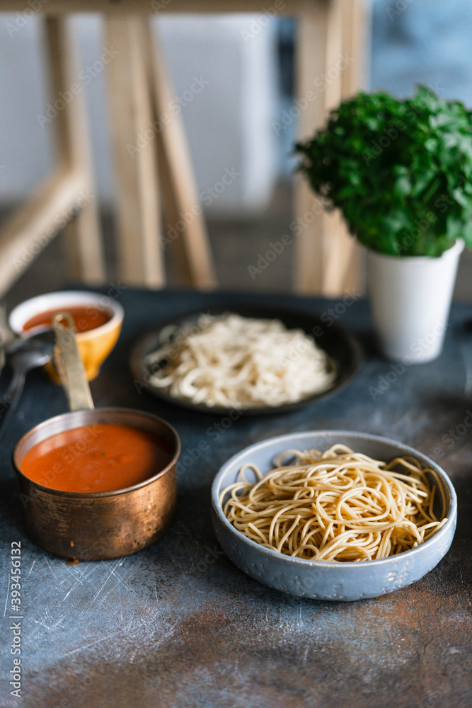 Spaghetti in plates on the table. Stock Photo | Adobe Stock