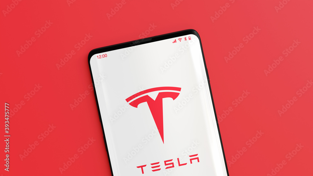 Mobile phone with the Tesla logo displayed. 3D rendering. Stock Photo ...