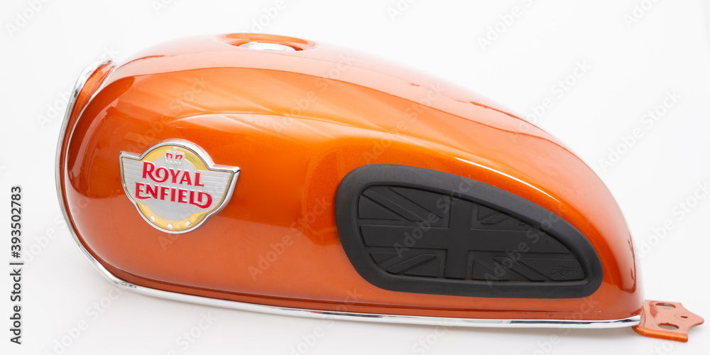 Royal Enfield retro logo and text sign on motorbike fuel tank orange ...