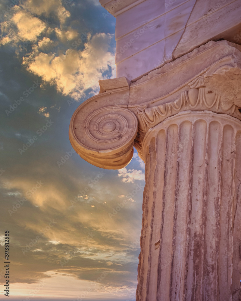 Ionic order column capital of ancient Greek temple and impressive sky ...
