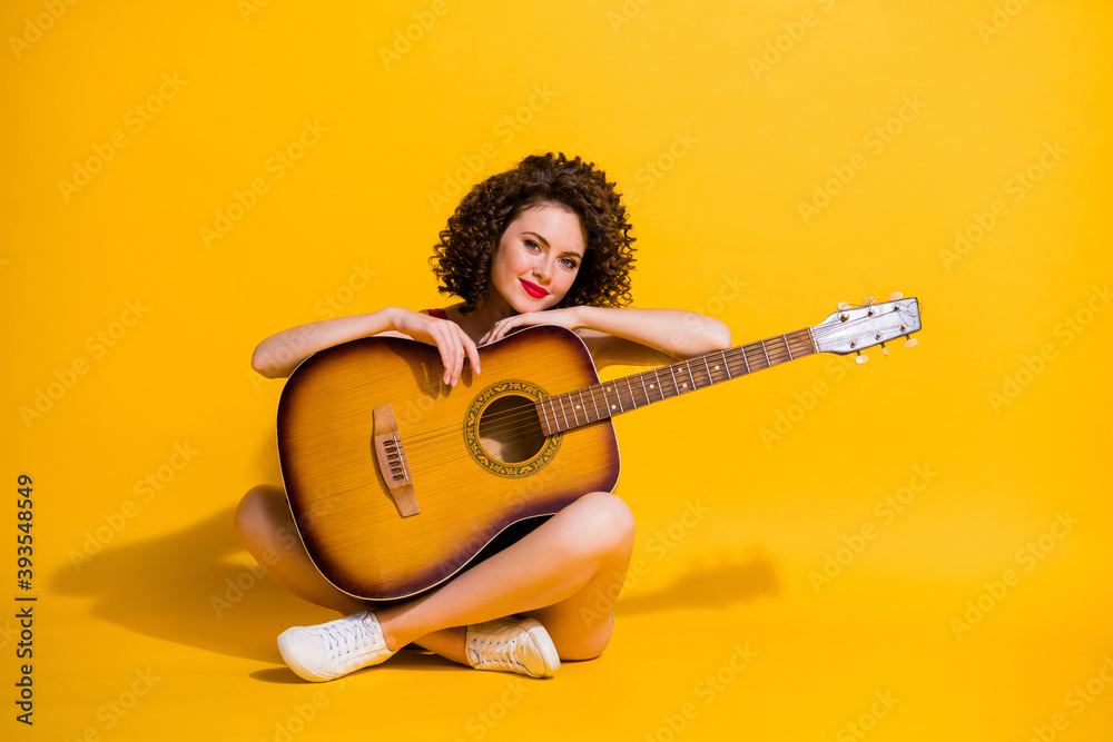 Full size photo of pretty lovely young musician girl sit hold guitar ...