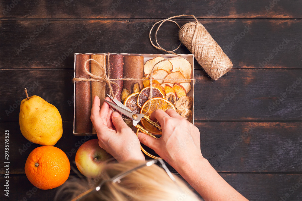 Gift with healthy sweets. Packaging boxes with sweet fruit snacks ...