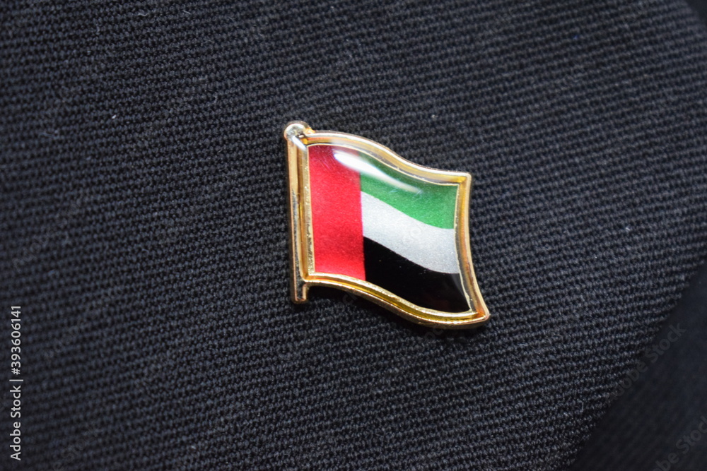 United Arab Emirates (UAE) flag lapel pin on a suit Stock Photo | Adobe ...