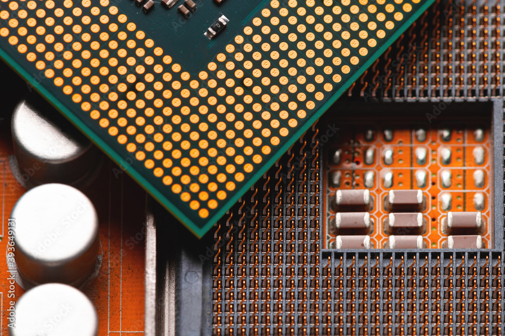 Blank cpu cpu socket with pins on motherboard in yellow color close-up ...