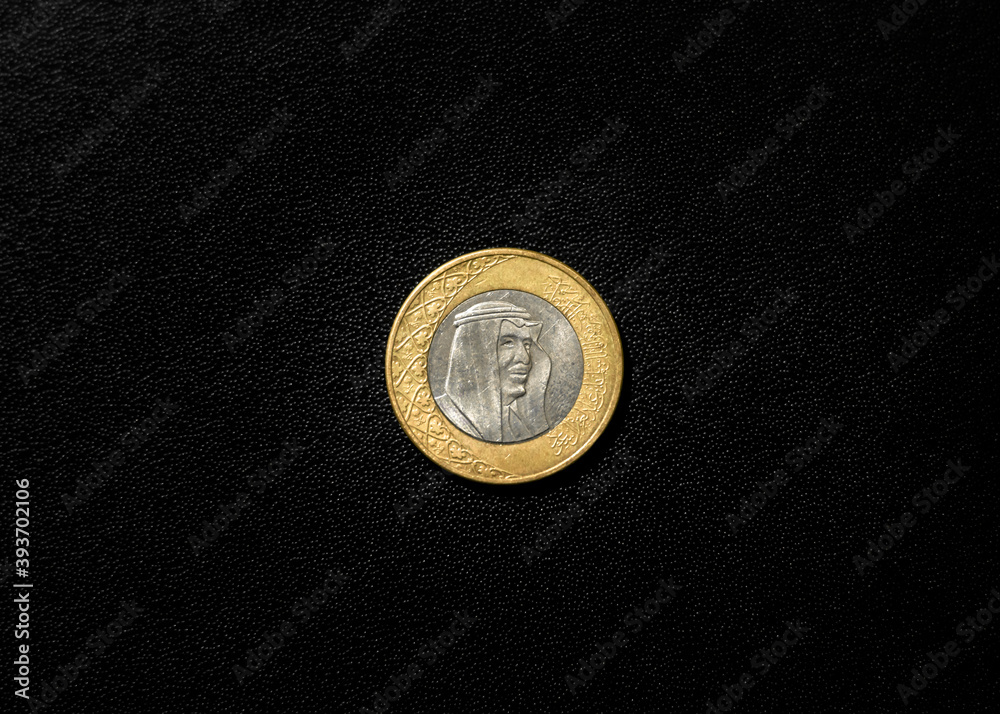 Extreme close up of Saudi Arabian and arabic islamic coins . arabic ...