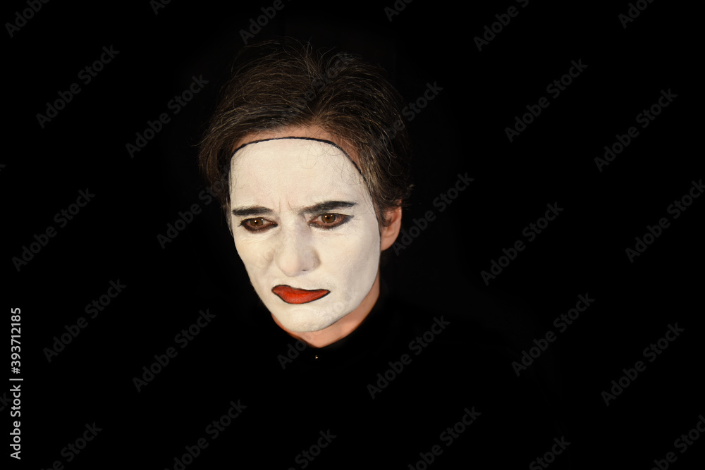Sad Man With Face Paint Against Black Background Stock Photo | Adobe Stock