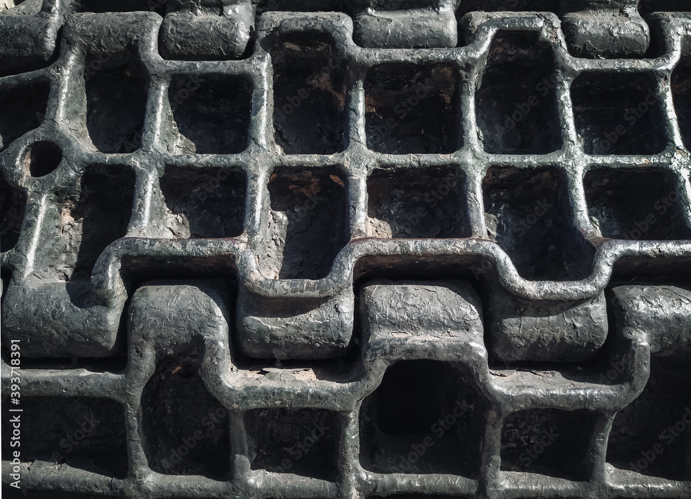 Steel black track from a Soviet military tank. Tread texture close-up ...