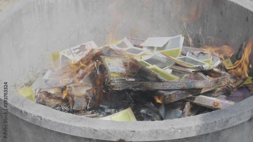Chinese men set firework and burned gold paper. Various appliances ...