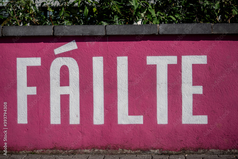 Sign in Irish language Failte welcome in English on a magenta color ...