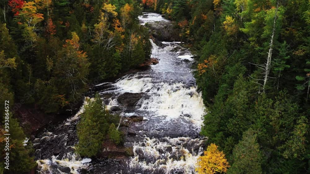 Beautiful panning down aerial looking down the Potato River to Upper ...