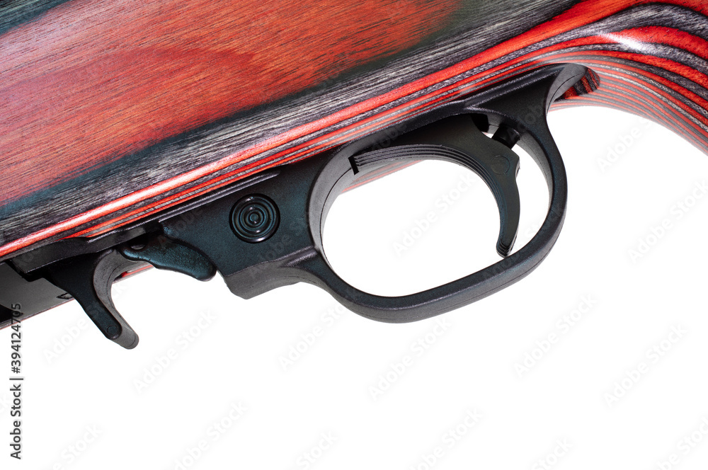 Trigger, safety and magazine release on a rifle Stock Photo | Adobe Stock