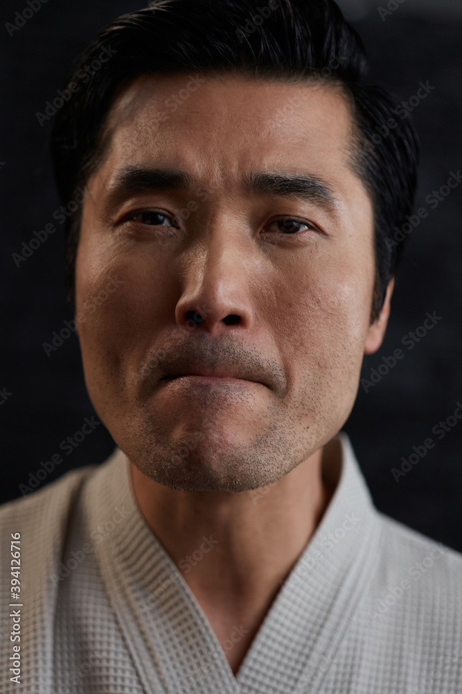 Man using lip balm Stock Photo | Adobe Stock