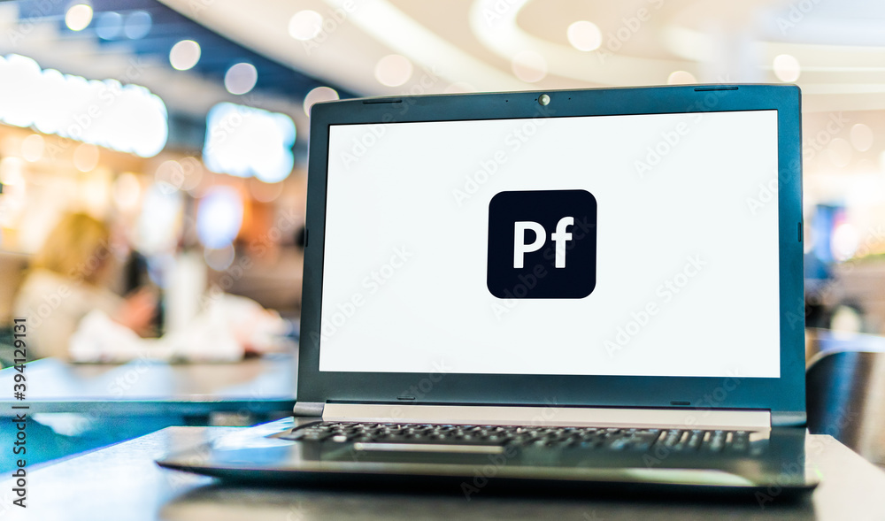 Laptop computer displaying logo of Adobe Portfolio Stock Photo | Adobe ...