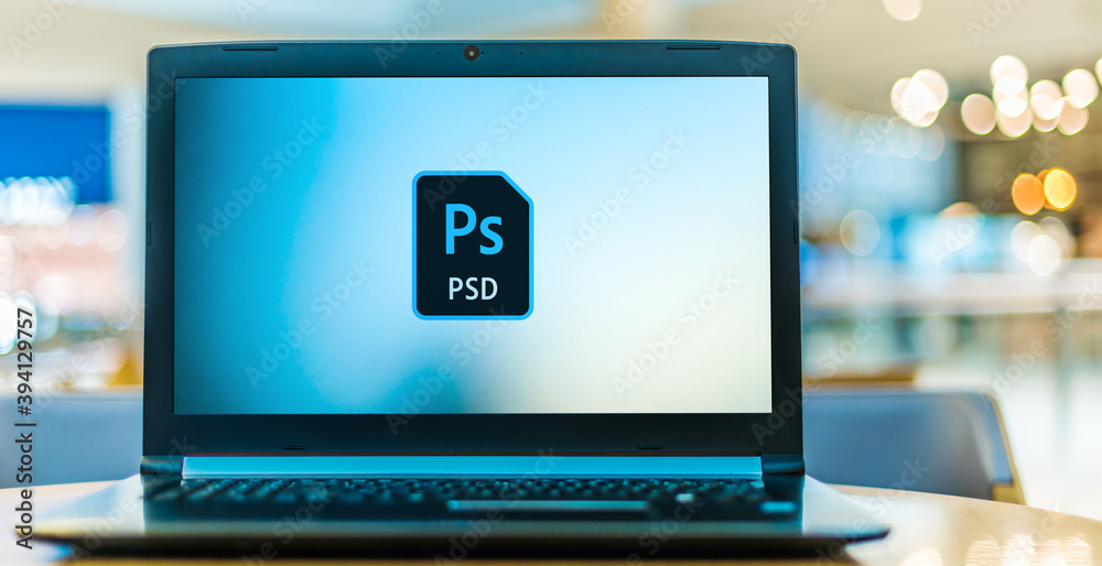 Laptop computer displaying logo of Adobe Photoshop file Stock Photo ...
