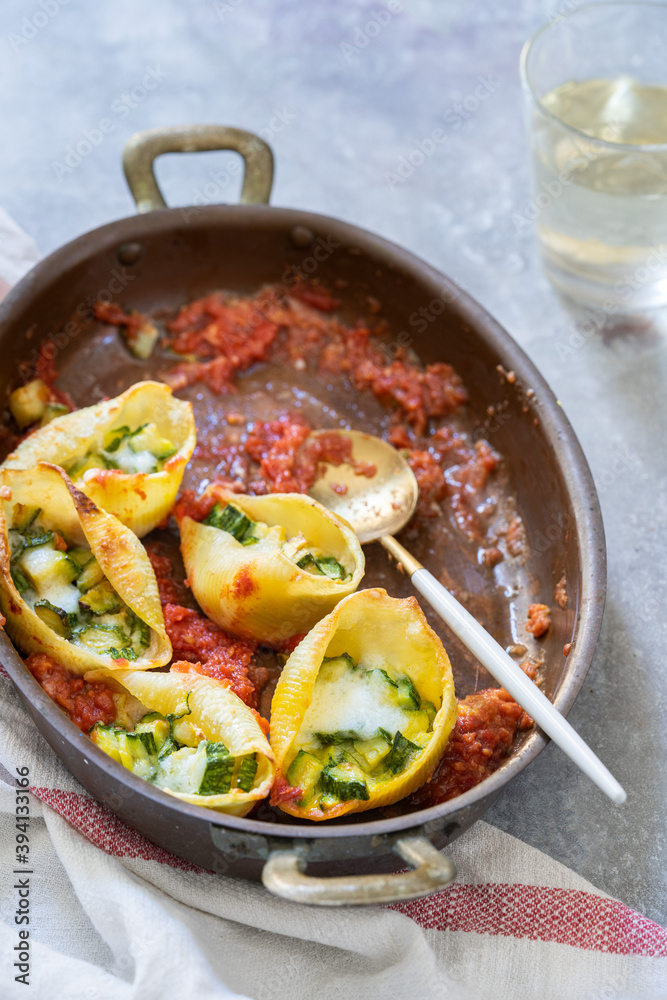 Pasta Shells filled with courgettes and cheese baked in tomato sauce ...