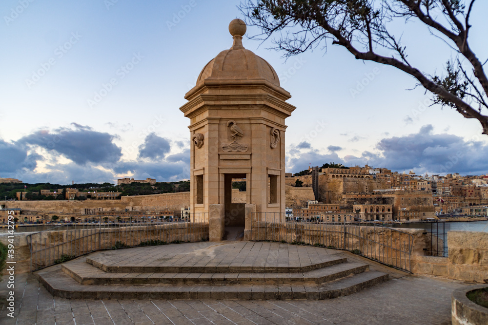The guard tower in the Gardjola Gardens has various symbols sculpted on ...