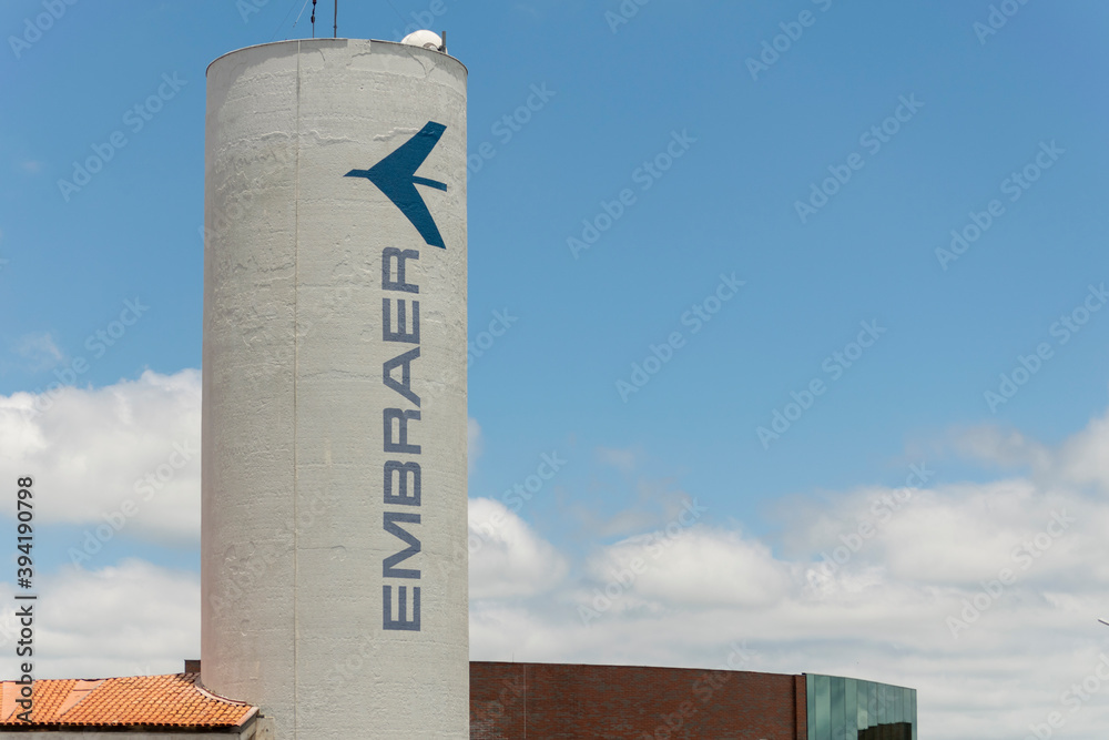 name of the Embraer factory in the water tower. Stock Photo | Adobe Stock