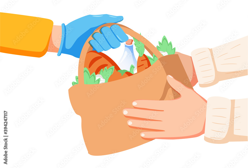 Volunteer holding a donation box with food using protective gloves ...