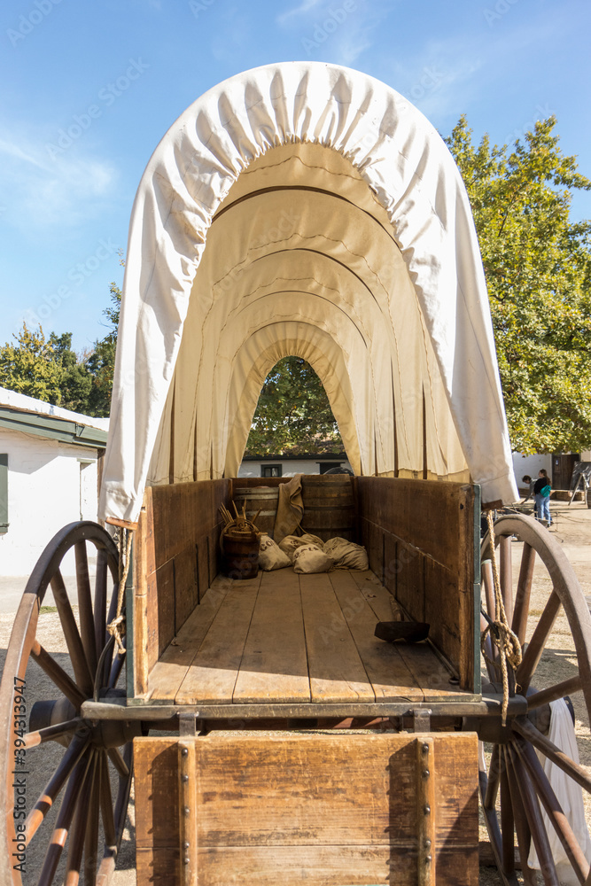 Inside view of a covered wagon with wood bed and canvas top Stock Photo ...