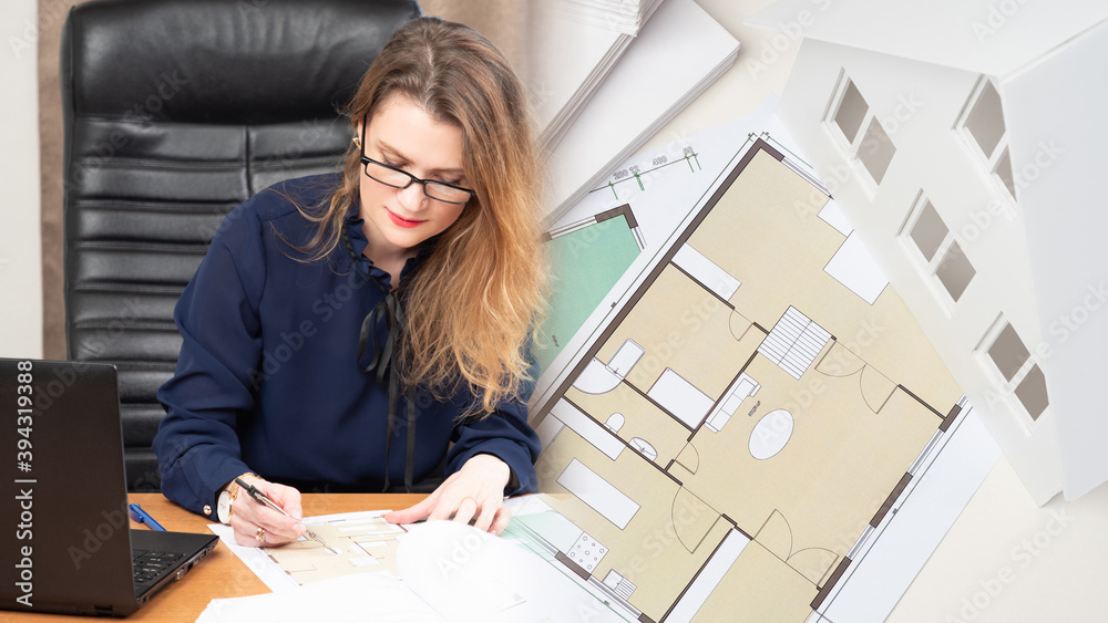 The architect is developing a project for a new house. The girl works ...