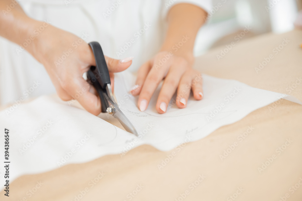 Step 3 process of sewing underwear and clothes, woman tailor cuts out ...