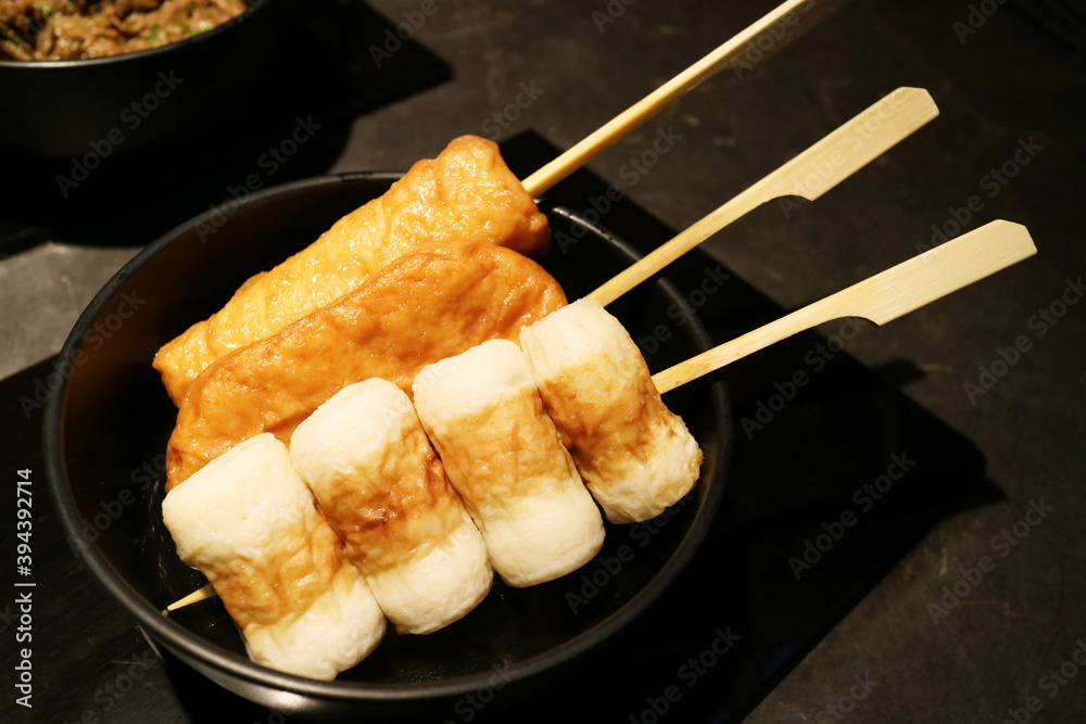 Oden, processed fishcakes stewed in a light, soy-flavored dashi broth ...