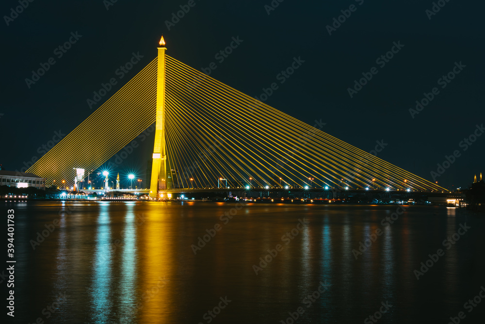 Foto de Nighttime at The Rama VIII or 8 Bridge is a cable-stayed bridge ...