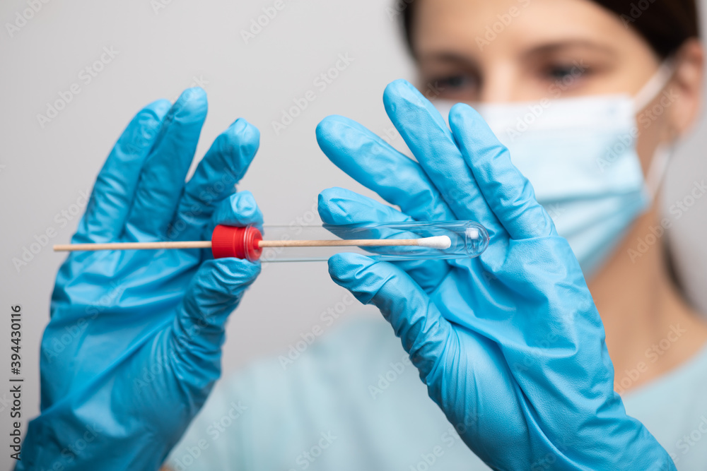 Medical healthcare nurse holding Coronavirus COVID-19 swab test kit ...