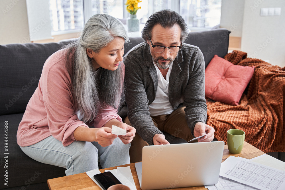 Couple are discussing documents Stock Photo | Adobe Stock