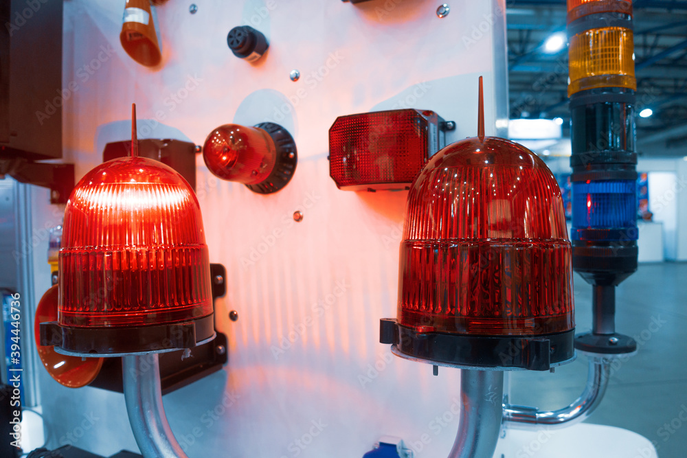 Emergency sirens. A working luminous emergency siren of orange-yellow ...