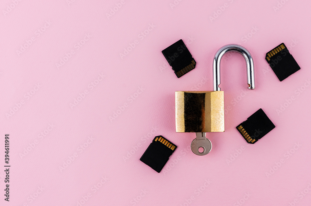 Data protection minimal concept. Flat lay setup on pink backdrop. Lock ...