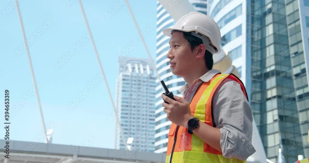 Young project engineer supervisor wearing safety personel protective ...