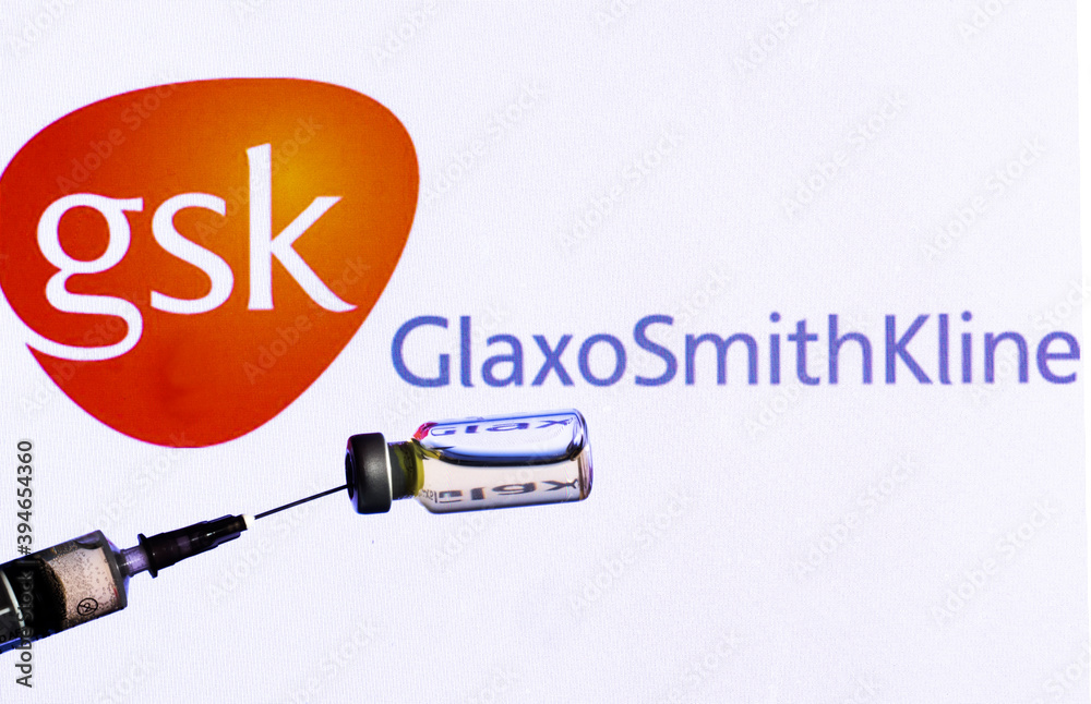 photoillustratn medical syringe an bottle of liquid is seen with ...