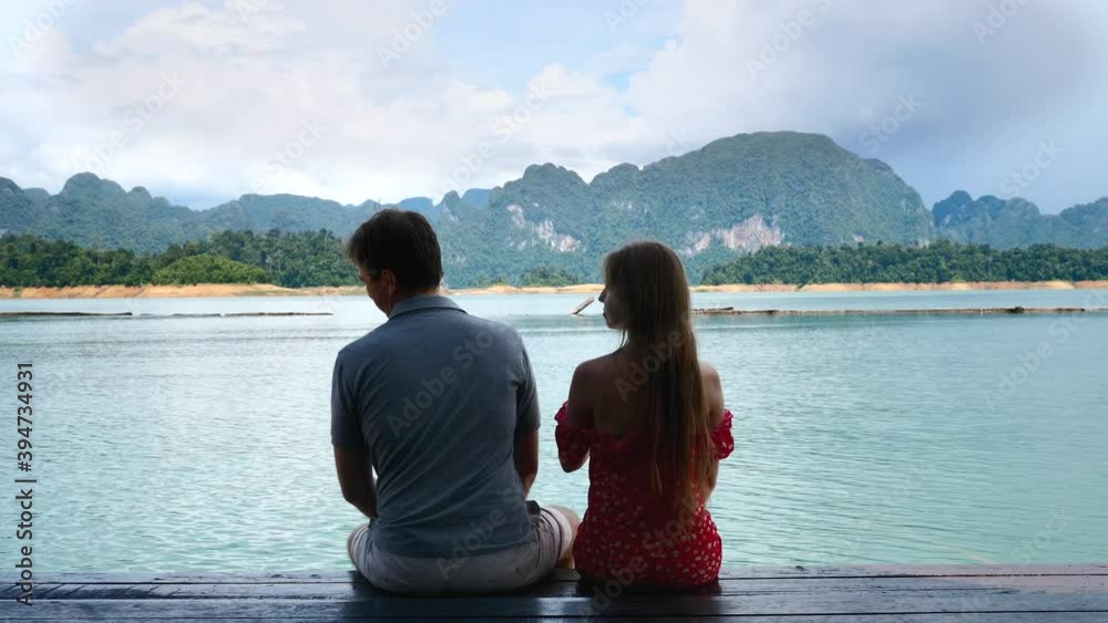 Back View of Couple in Love Sitting Together on Date, Man Flirting ...