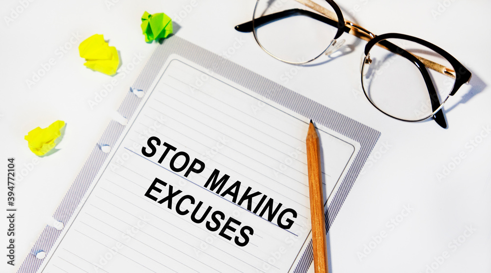 On the sheet from the diary text STOP MAKING EXCUSES, next to glasses ...