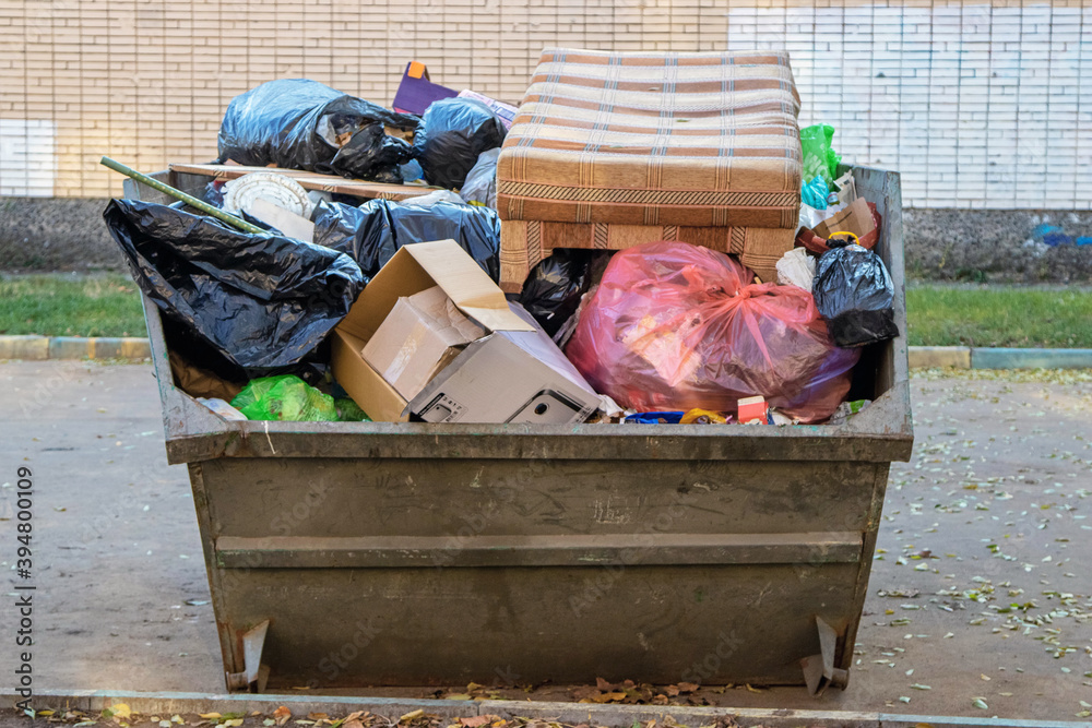 Large iron dumpster with various large garbage Stock-Foto | Adobe Stock