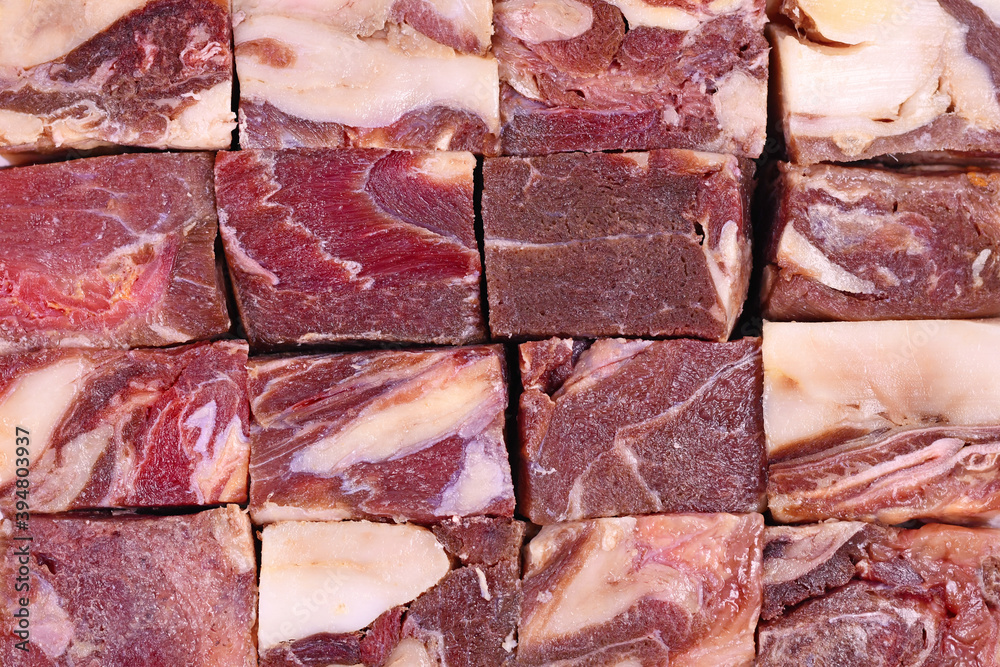Big chunks of streaked red meat with lots of fat used for raw feeding ...