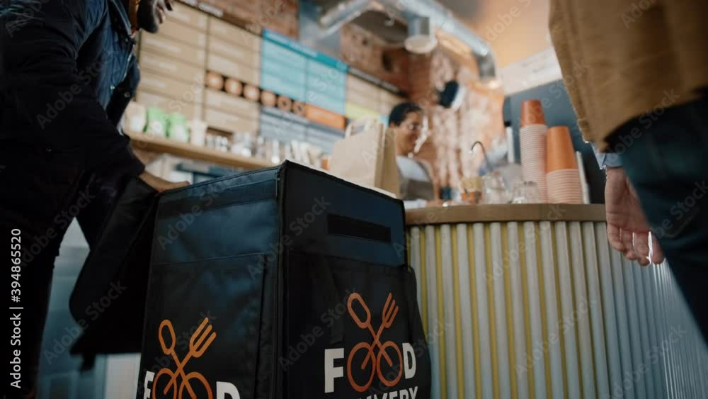 Beautiful Happy Latin Barista Serves Order to a Food Delivery Courier ...