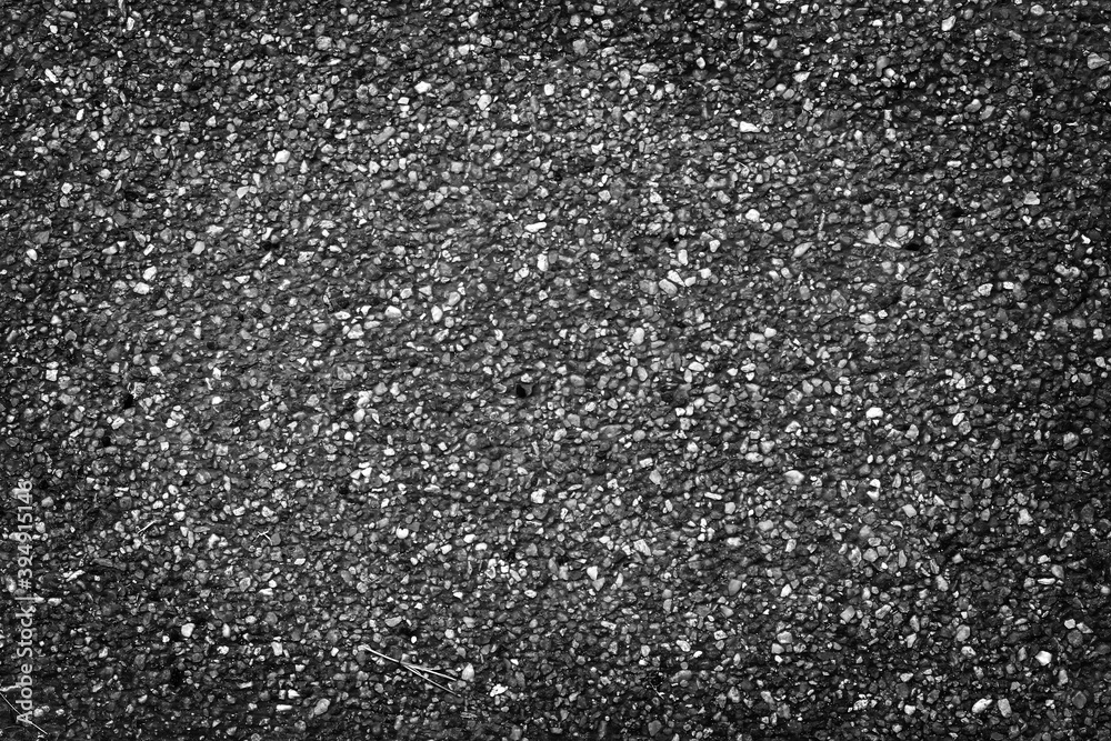Dark black gravel small texture decorative on concrete wall abstract ...