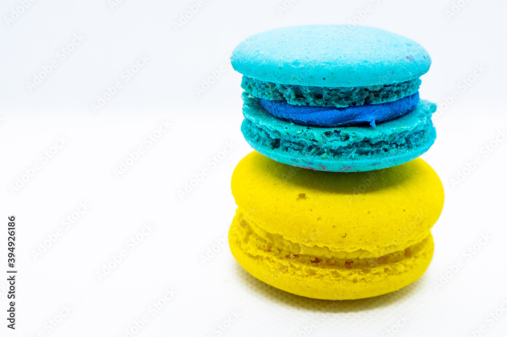 Macaroni, blue, yellow , are stacked one on top of the other in the ...