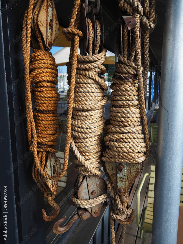 Sailing vessel ropes and wooden poulleys rigging Stock Photo | Adobe Stock