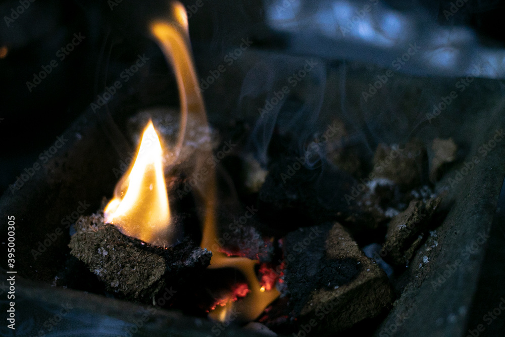 Fire Flame Cow dung Coal lit up with camphor during Worship of Diwali ...