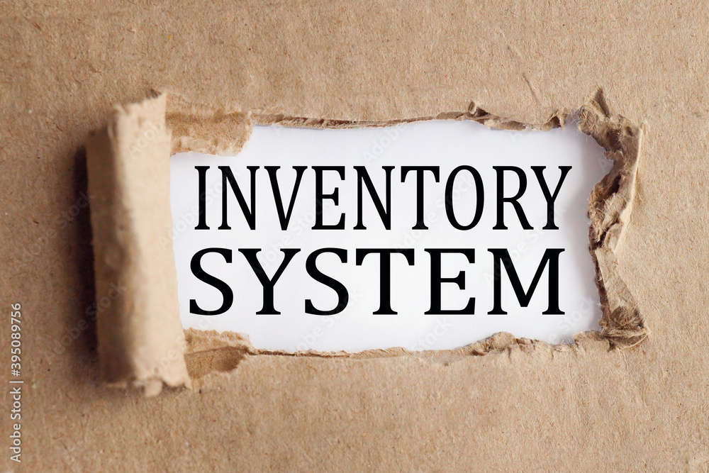 INVENTORY SYSTEM, text on white paper on torn paper background Stock ...