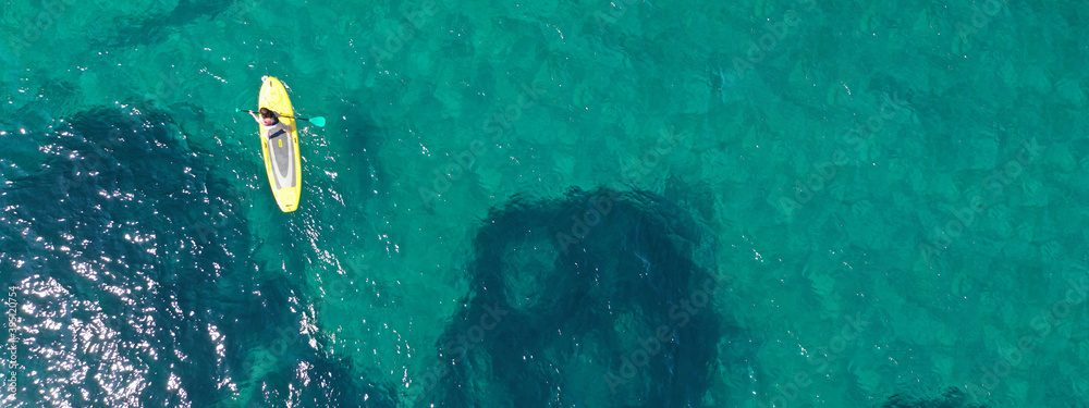 Aerial drone ultra wide top down photo of fit unidentified woman ...