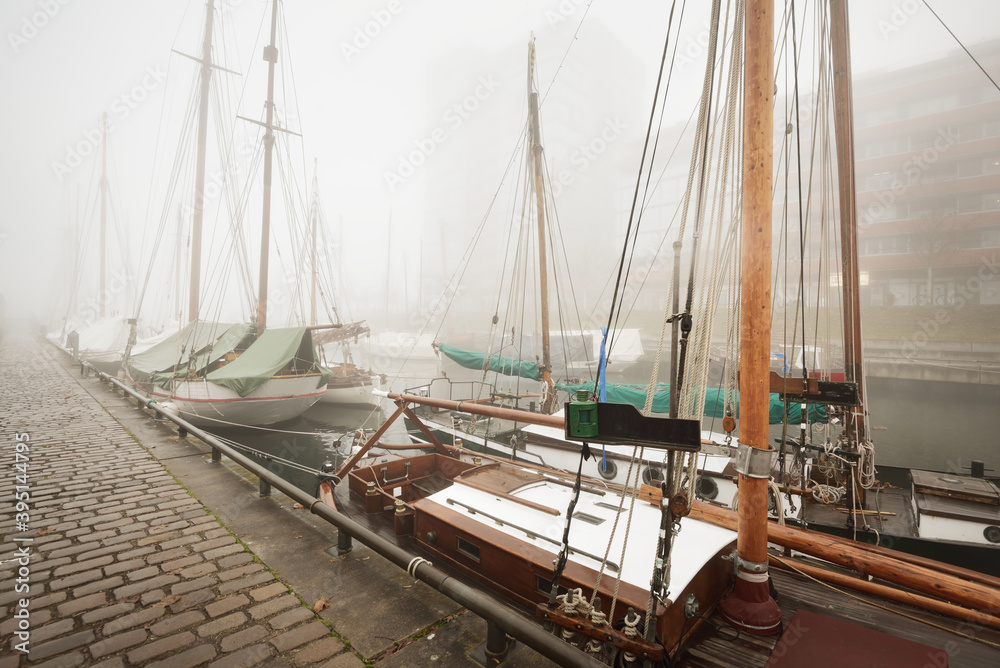 Elegant and modern yachts, sailing and fishing boats, small ships ...