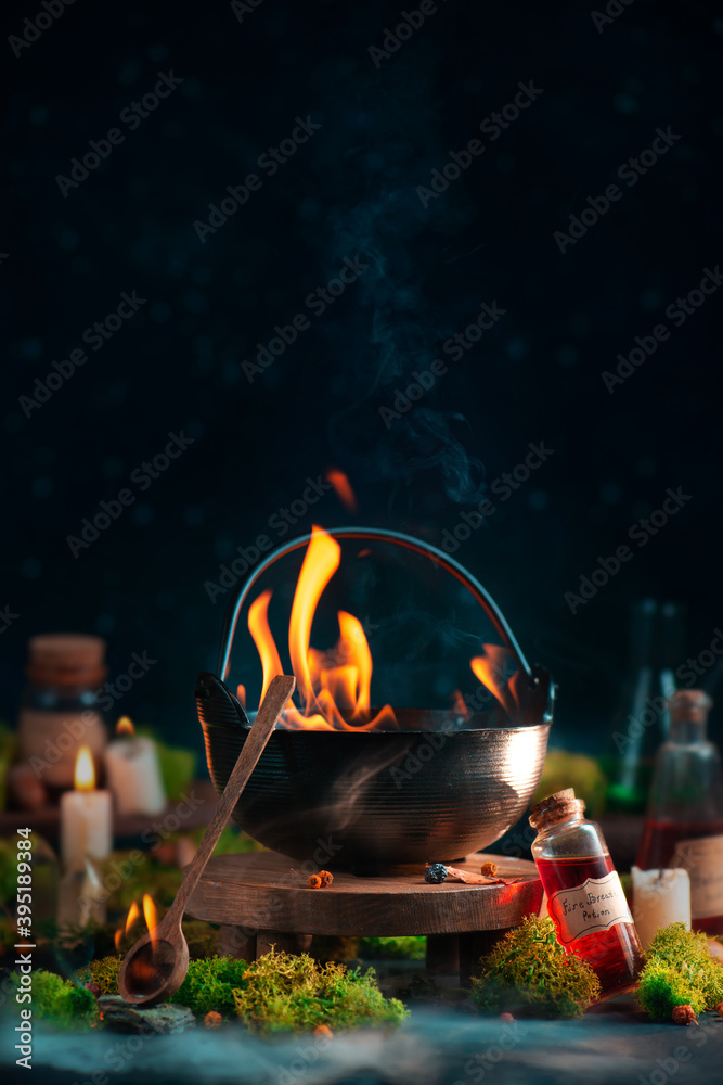 Fire breath potion bottle with cauldron, flames, and moss on a witch ...
