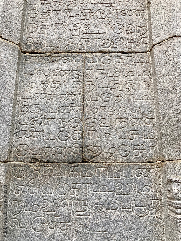Inscriptions on the ancient temple stone walls. Ancient stone carving ...