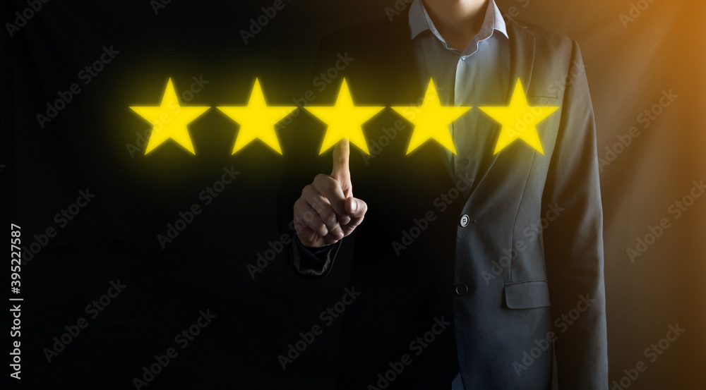 Man hand showing on five star excellent rating.pointing five star ...