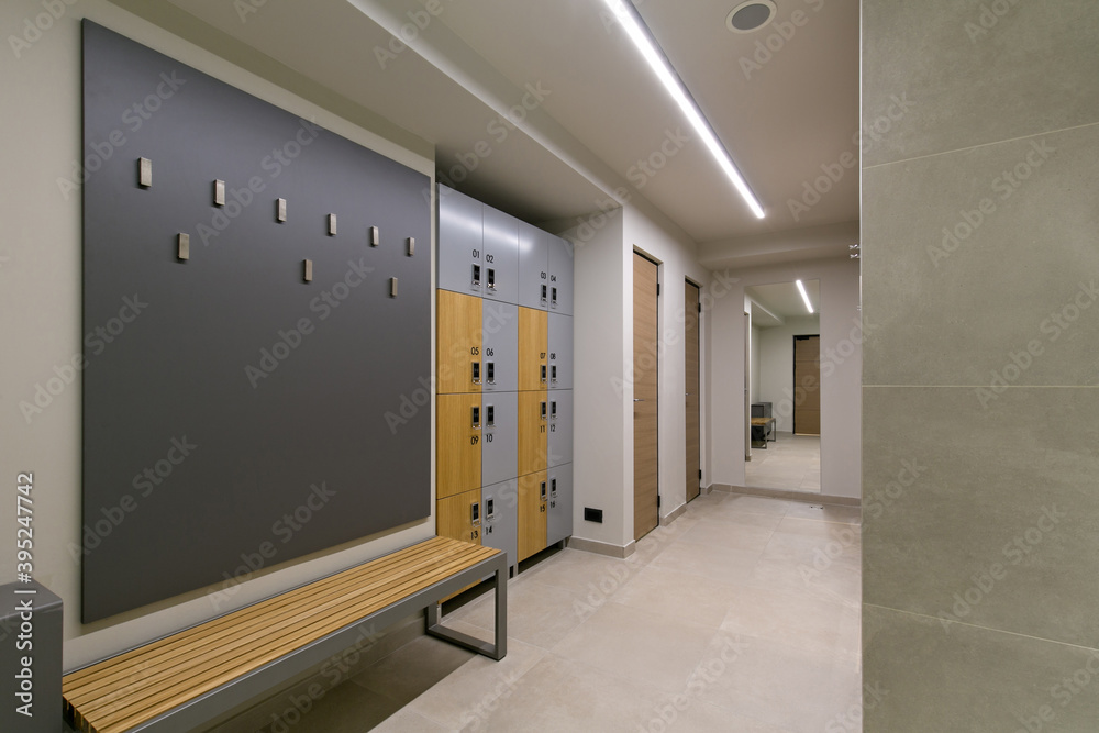 Locker room interior with key card access to locker in gym fitness ...